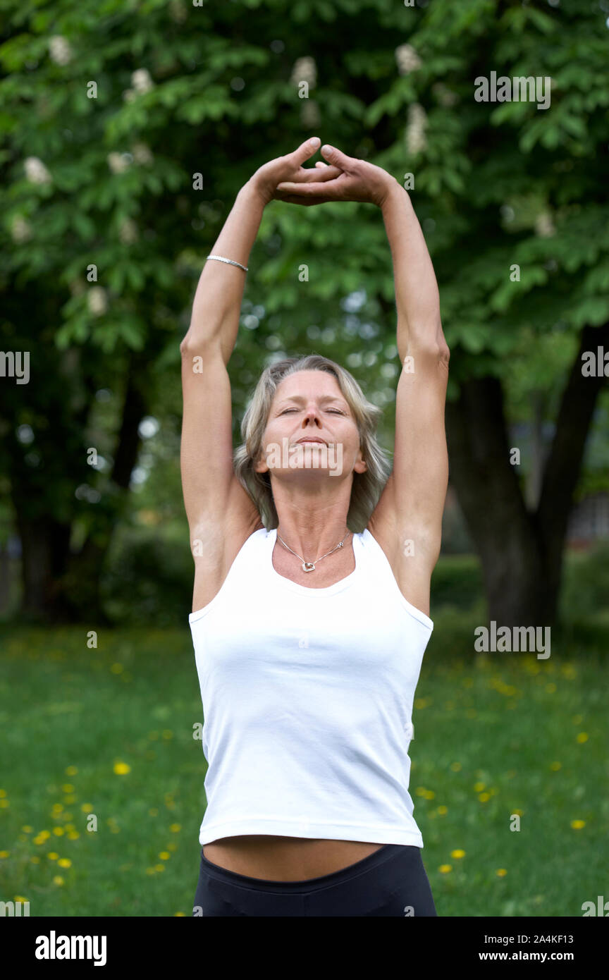 Arms upwards stretched hi-res stock photography and images - Alamy