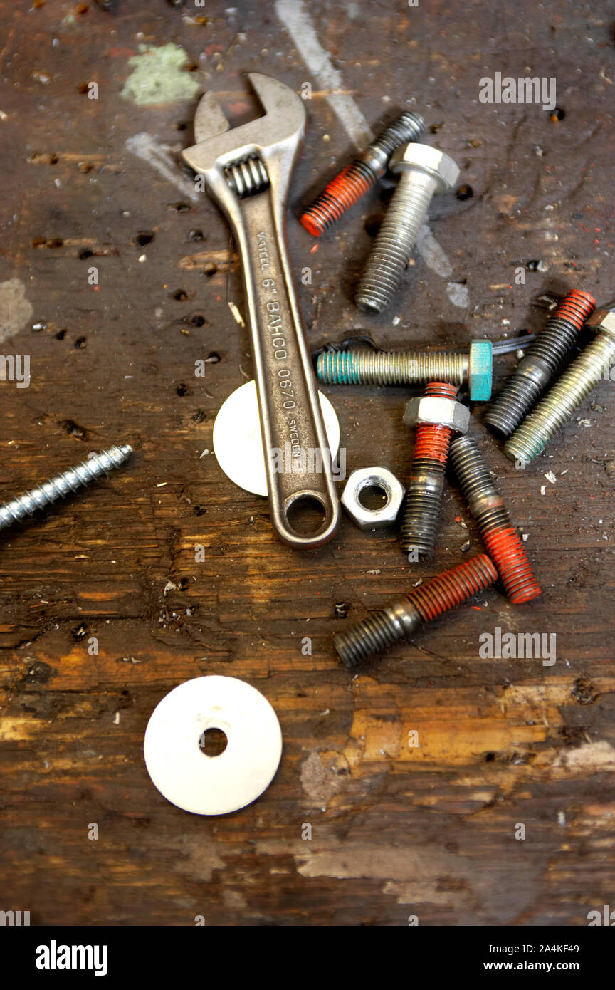 Pair of tongs and screws. Mechanic's tools Stock Photo - Alamy