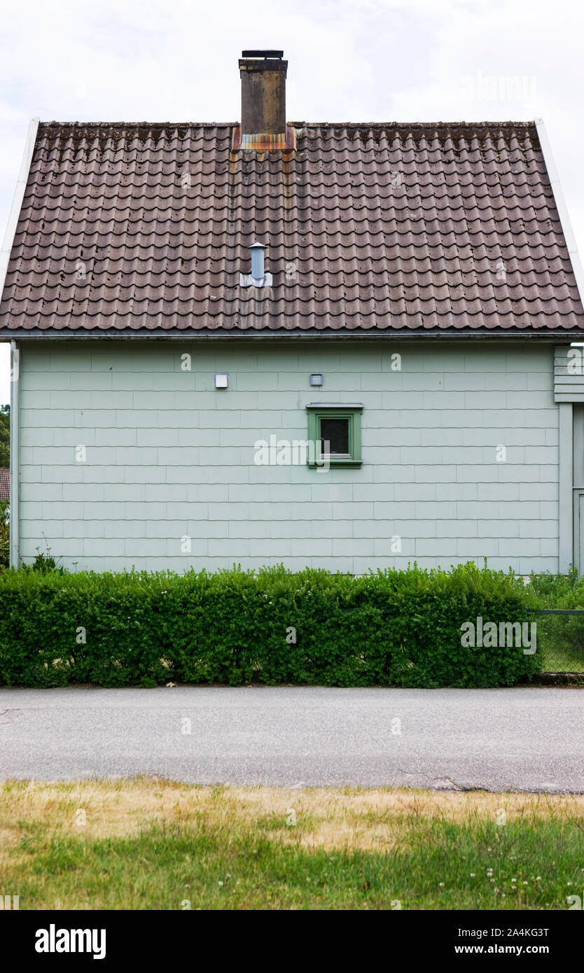Wooden house with one small window. Very private Stock Photo - Alamy