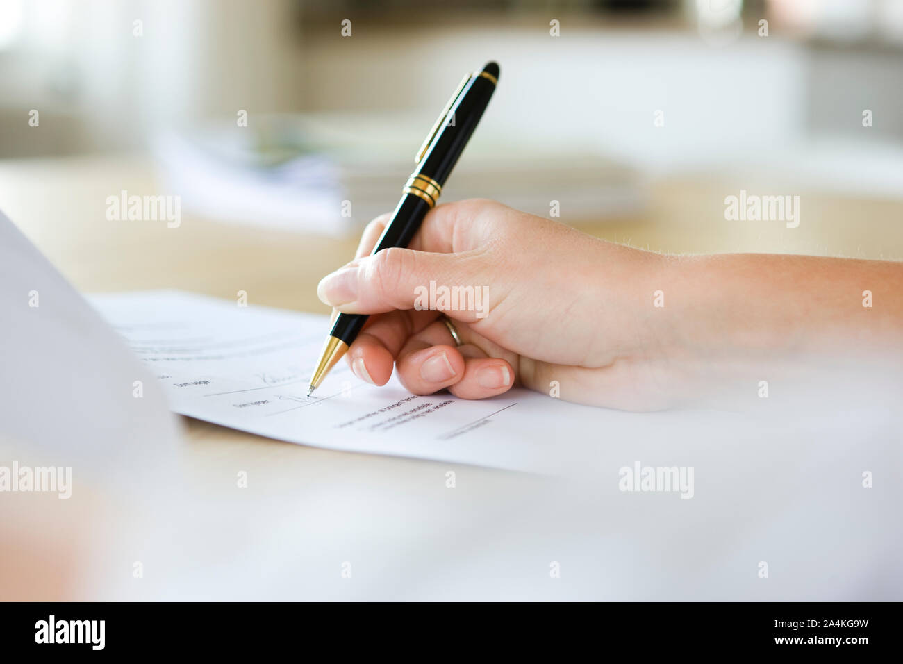 Person writing - author - reading a document - signing a contract Stock ...