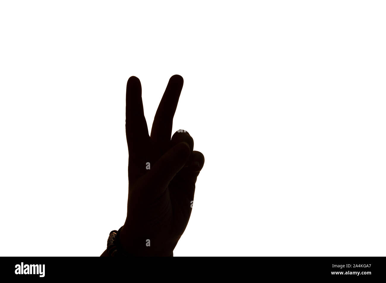 A single left hand in silhouette against a white background holding up ...