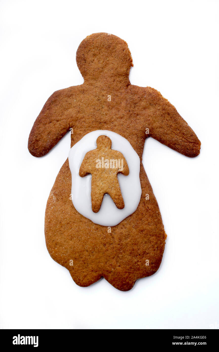 Pregnant gingerbread woman Stock Photo - Alamy