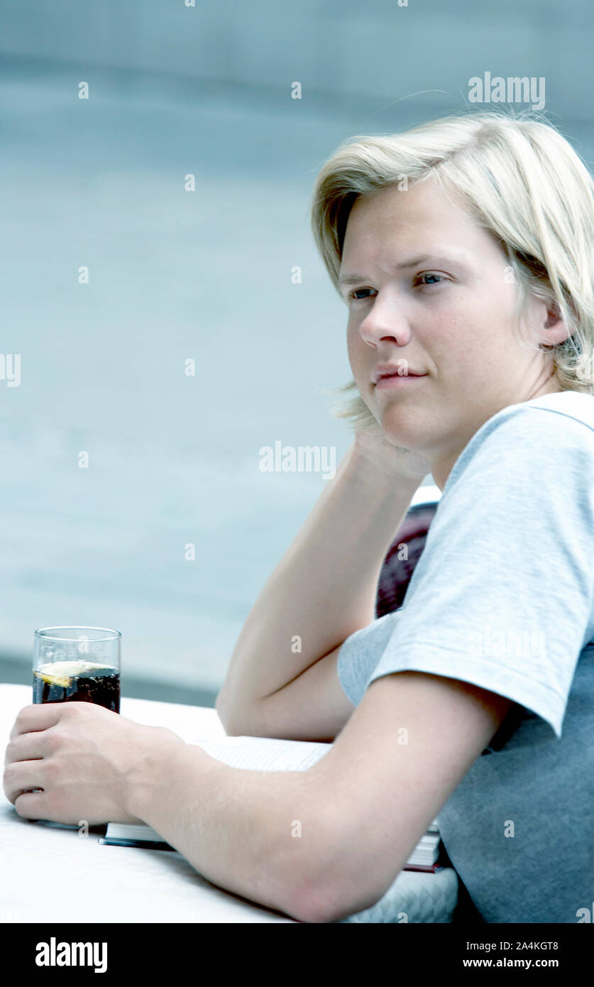 Drinking coca cola Stock Photo - Alamy