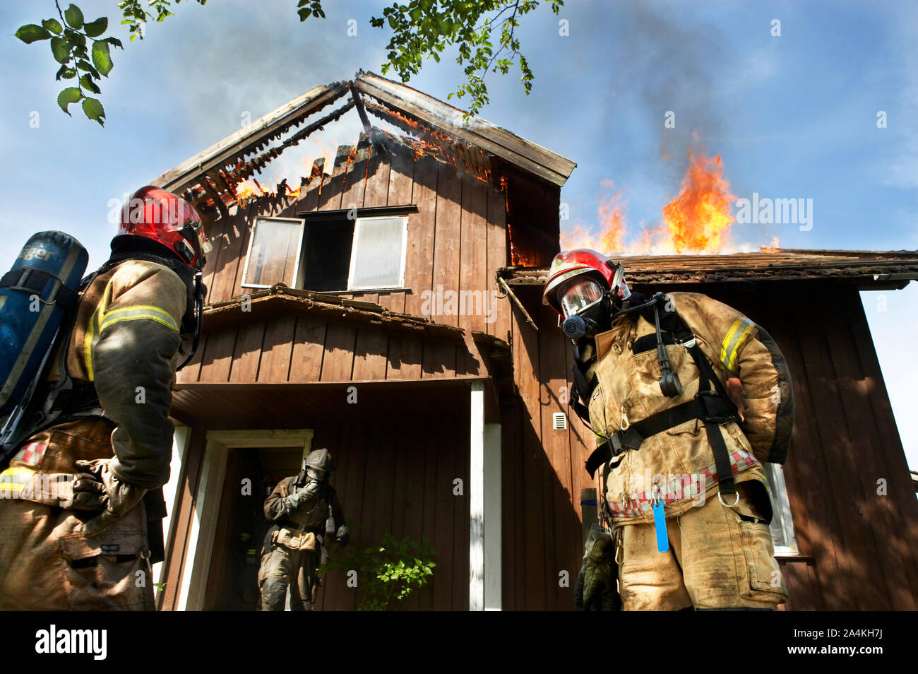 Firemen at work Stock Photo - Alamy