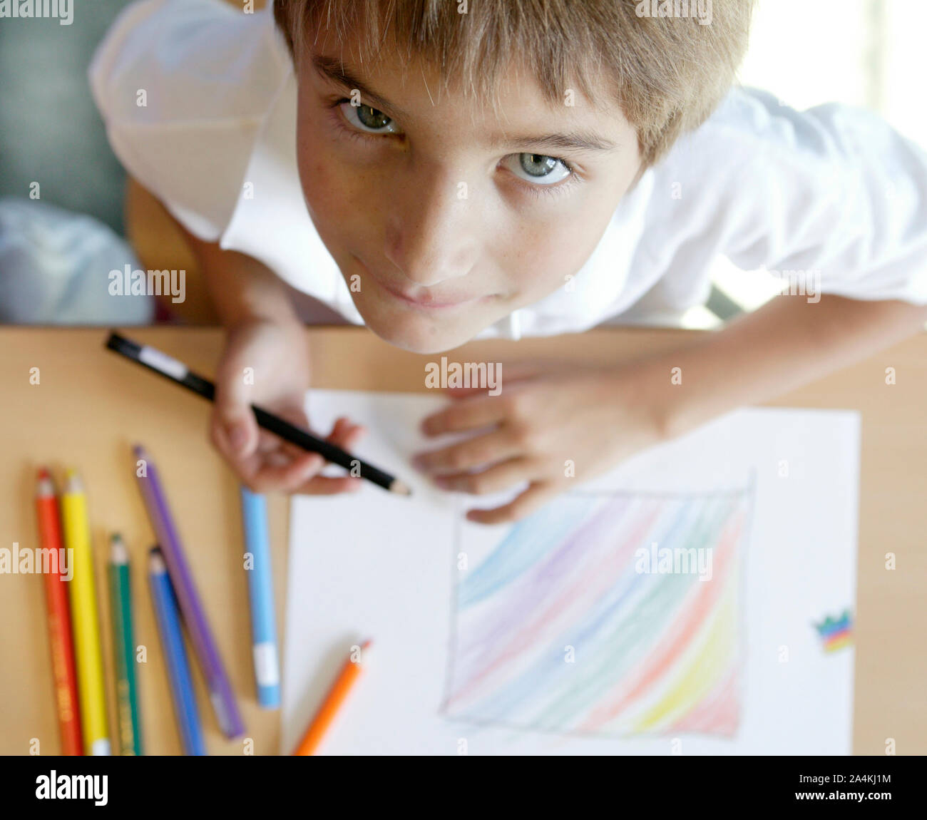 Pupil in a classroom - concentration Stock Photo - Alamy
