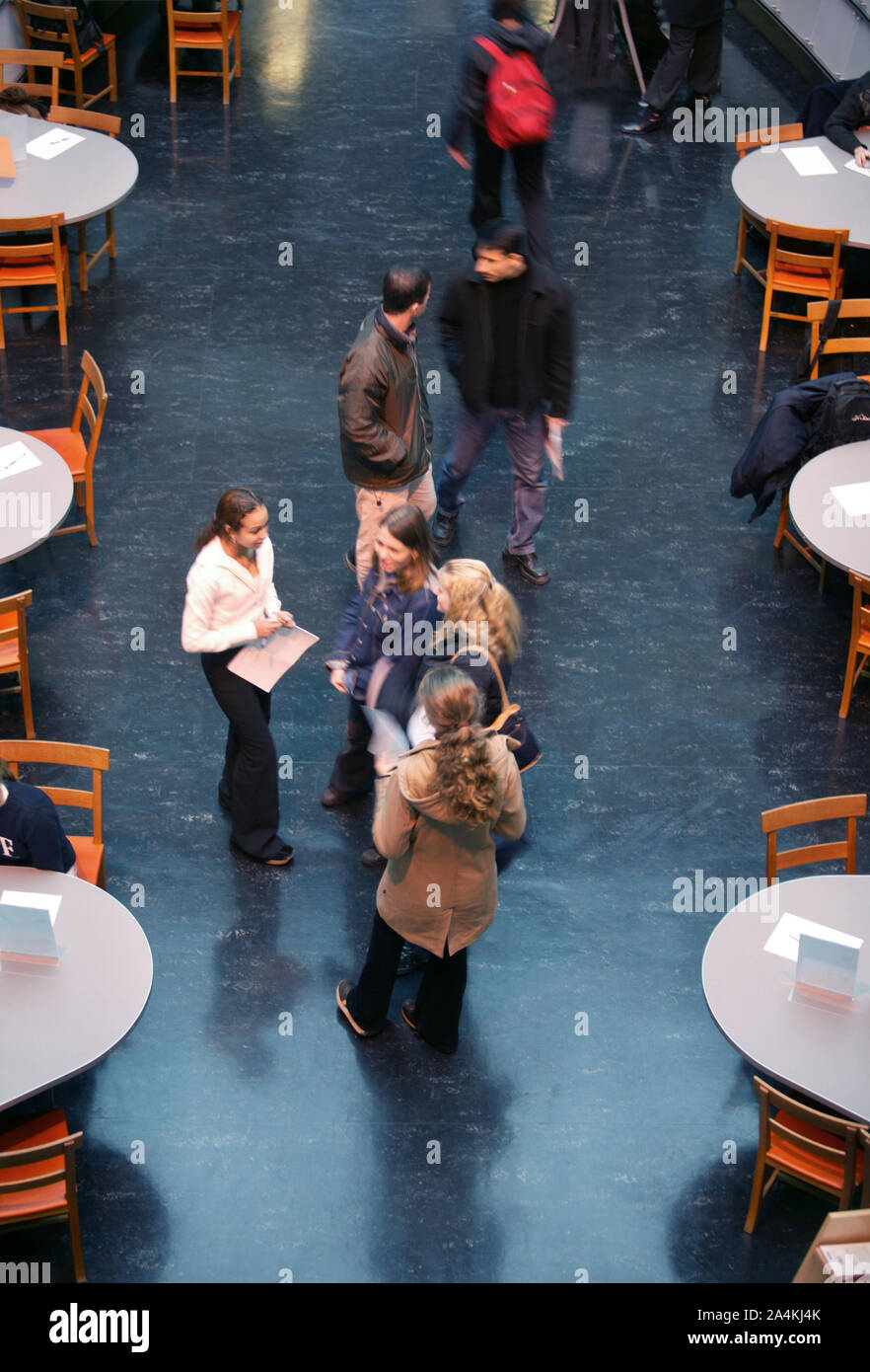 People in a library Stock Photo - Alamy