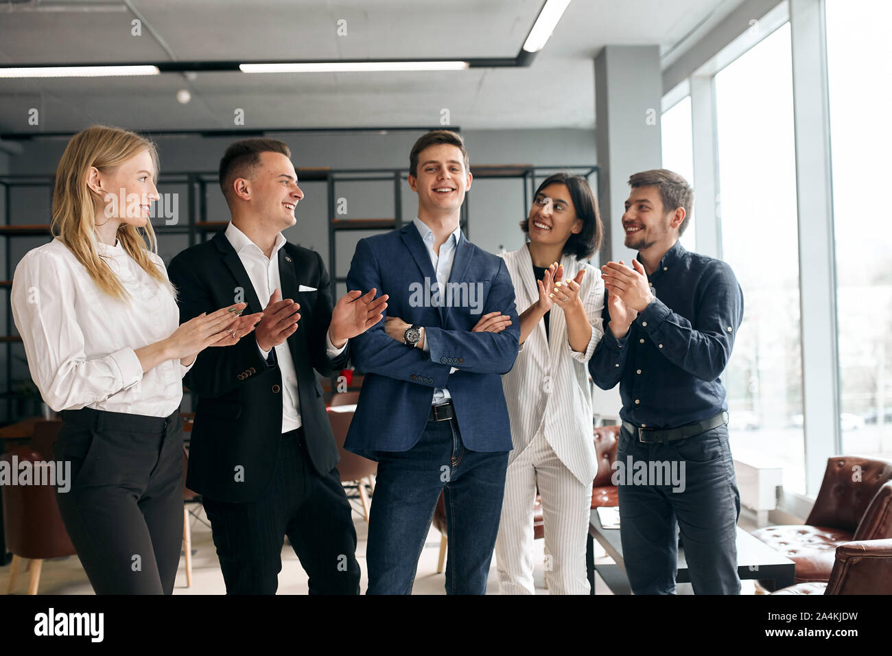 Business team celebrating their co-woker with promotion, happiness ...