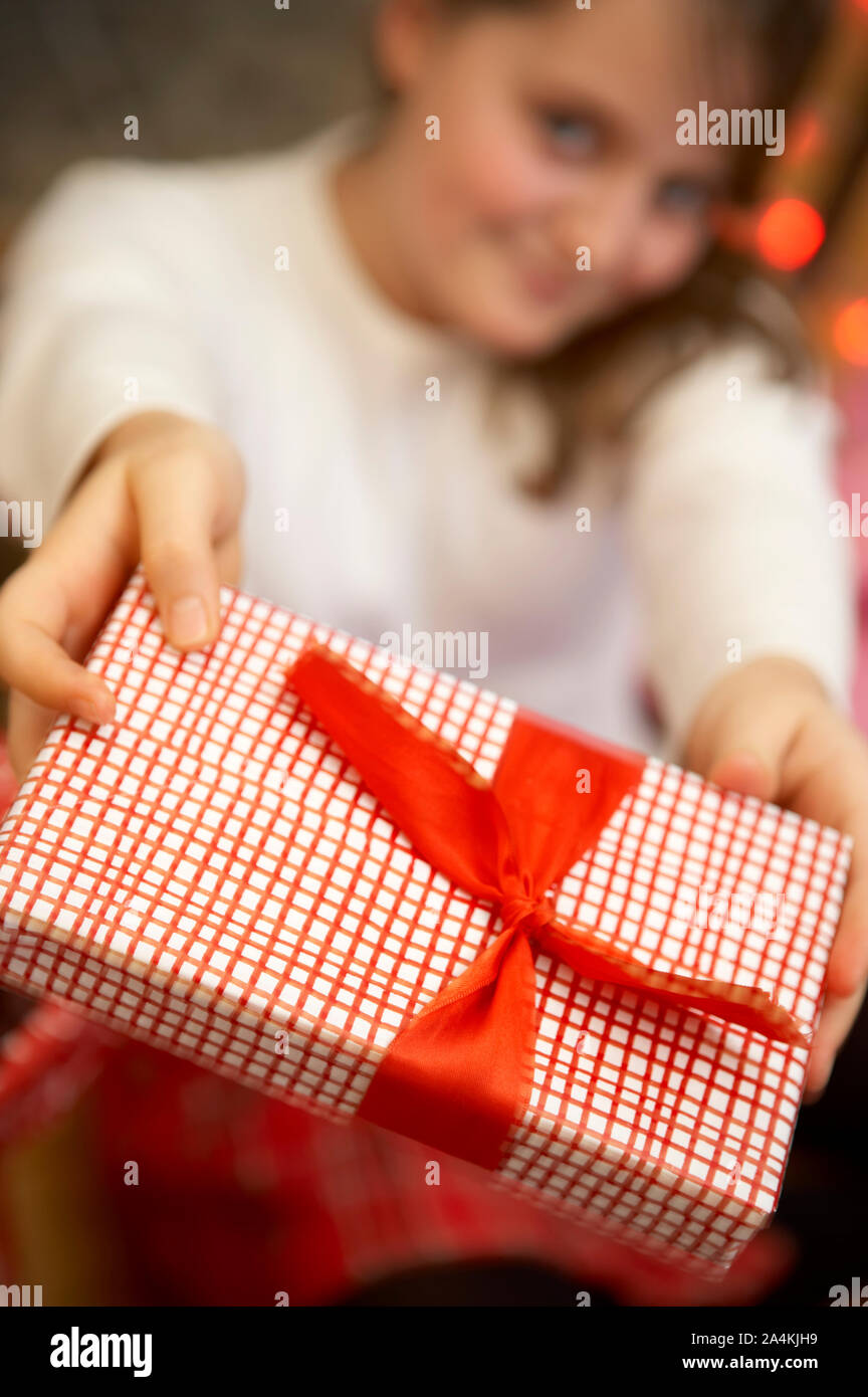 Girl with gift Stock Photo - Alamy