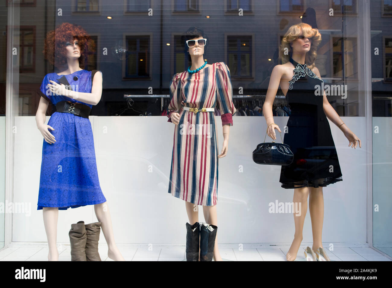 Display window with mannequins in vintage dresses Stock Photo - Alamy