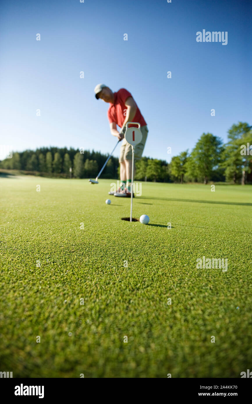 Playing golf in Norway Stock Photo - Alamy