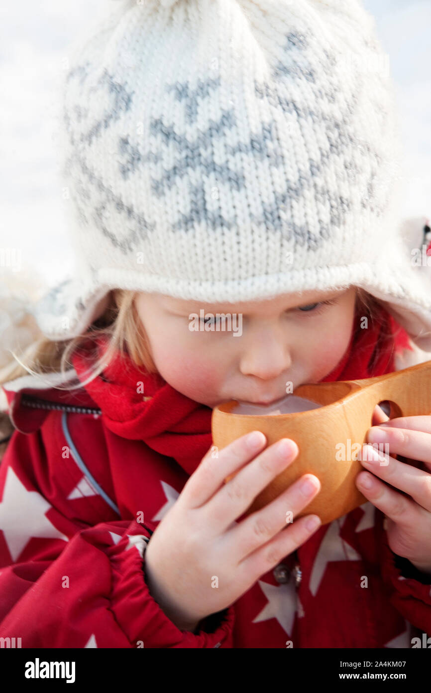 Child warm hat drinking hot chocolate hi-res stock photography and ...