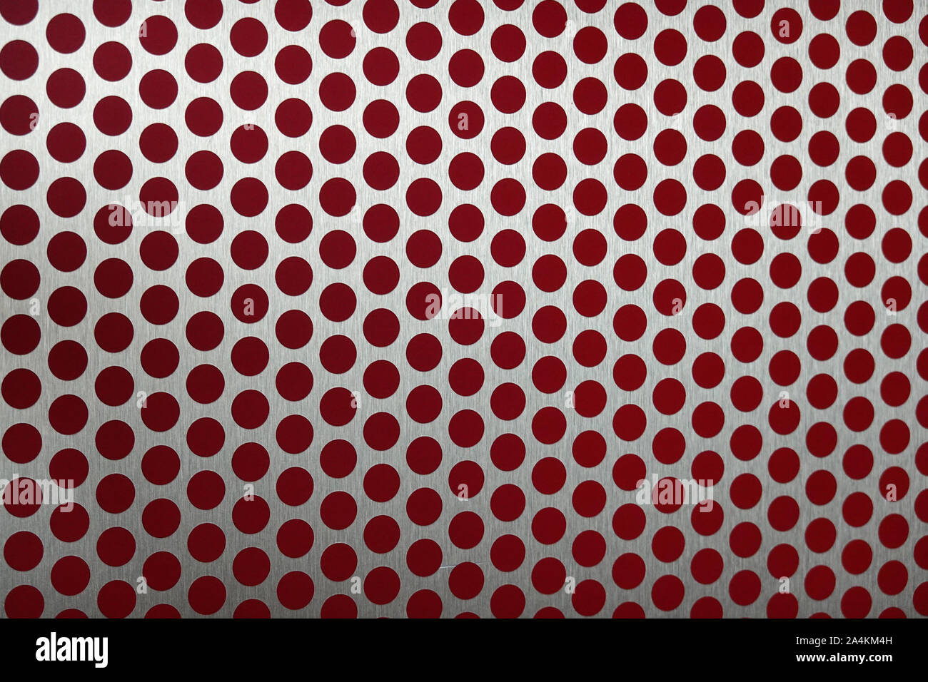 Red circular design on a wall that can be used as a background for ...