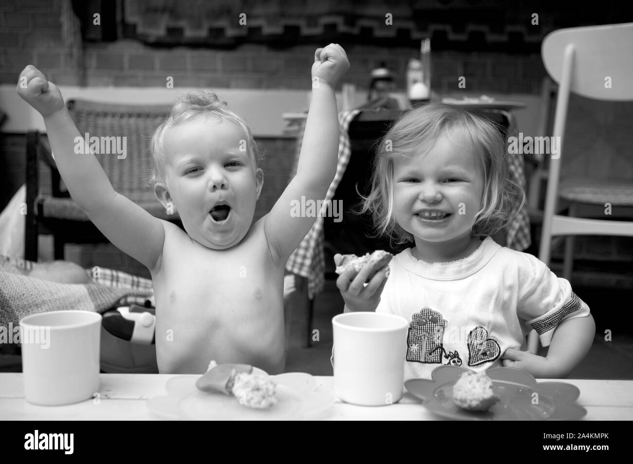 Children having breakfast Stock Photo - Alamy