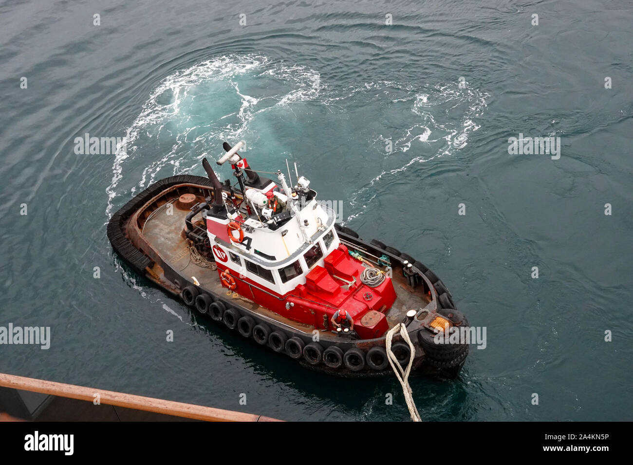 Victoria/Canada-9/14/19: A tug boat drags the boat dock lines from a ...