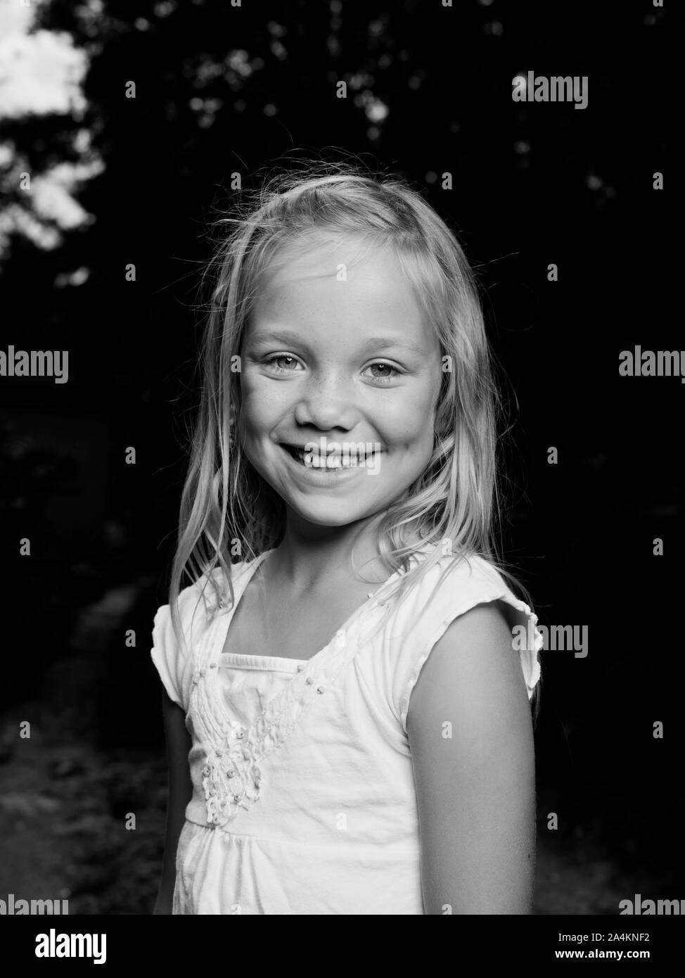 Happy blond girl in Black and White Stock Photos & Images - Alamy