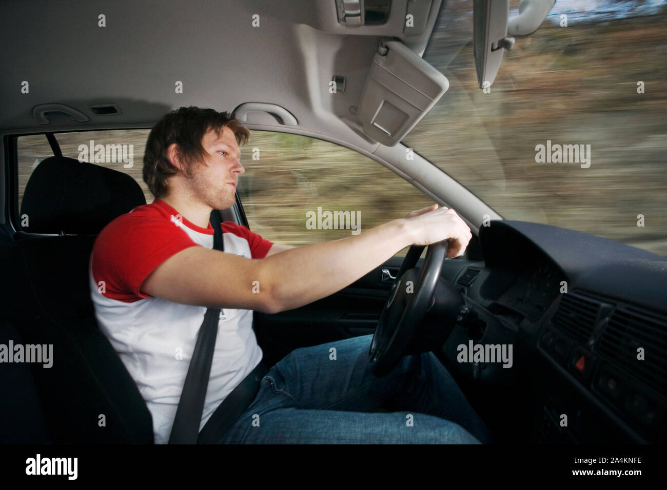 Man driving car Stock Photo - Alamy
