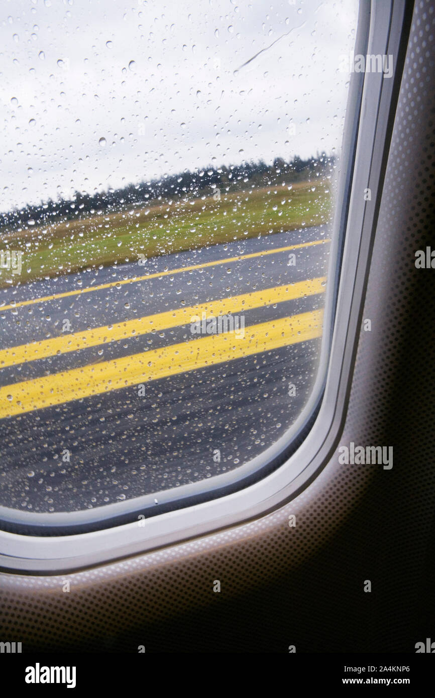 Airplane window view - takeoff - landing - runway Stock Photo - Alamy