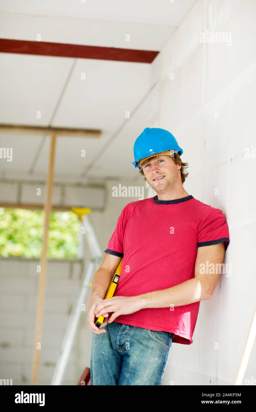Workman with safety helmet Stock Photo - Alamy