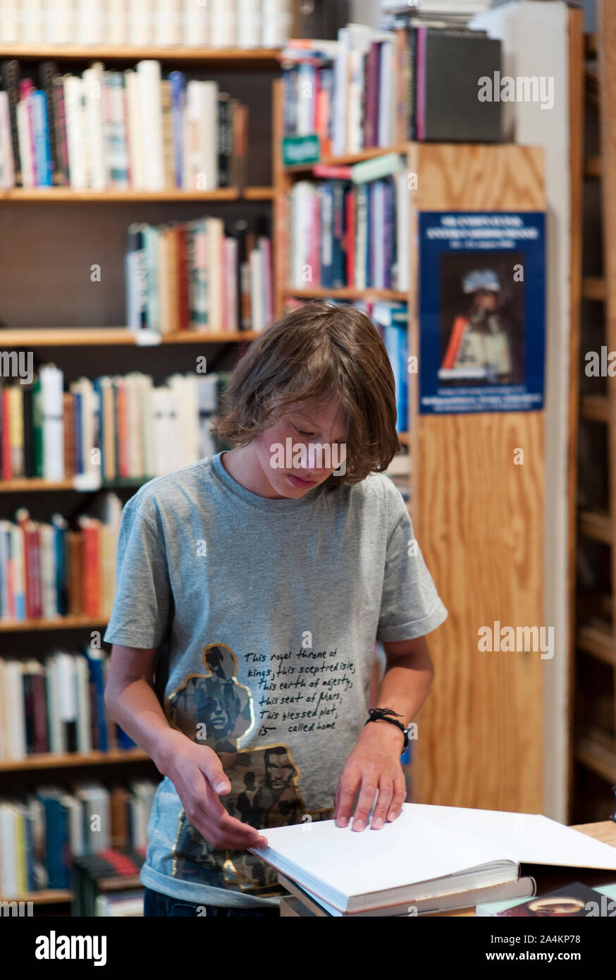 Boy at the library Stock Photo - Alamy