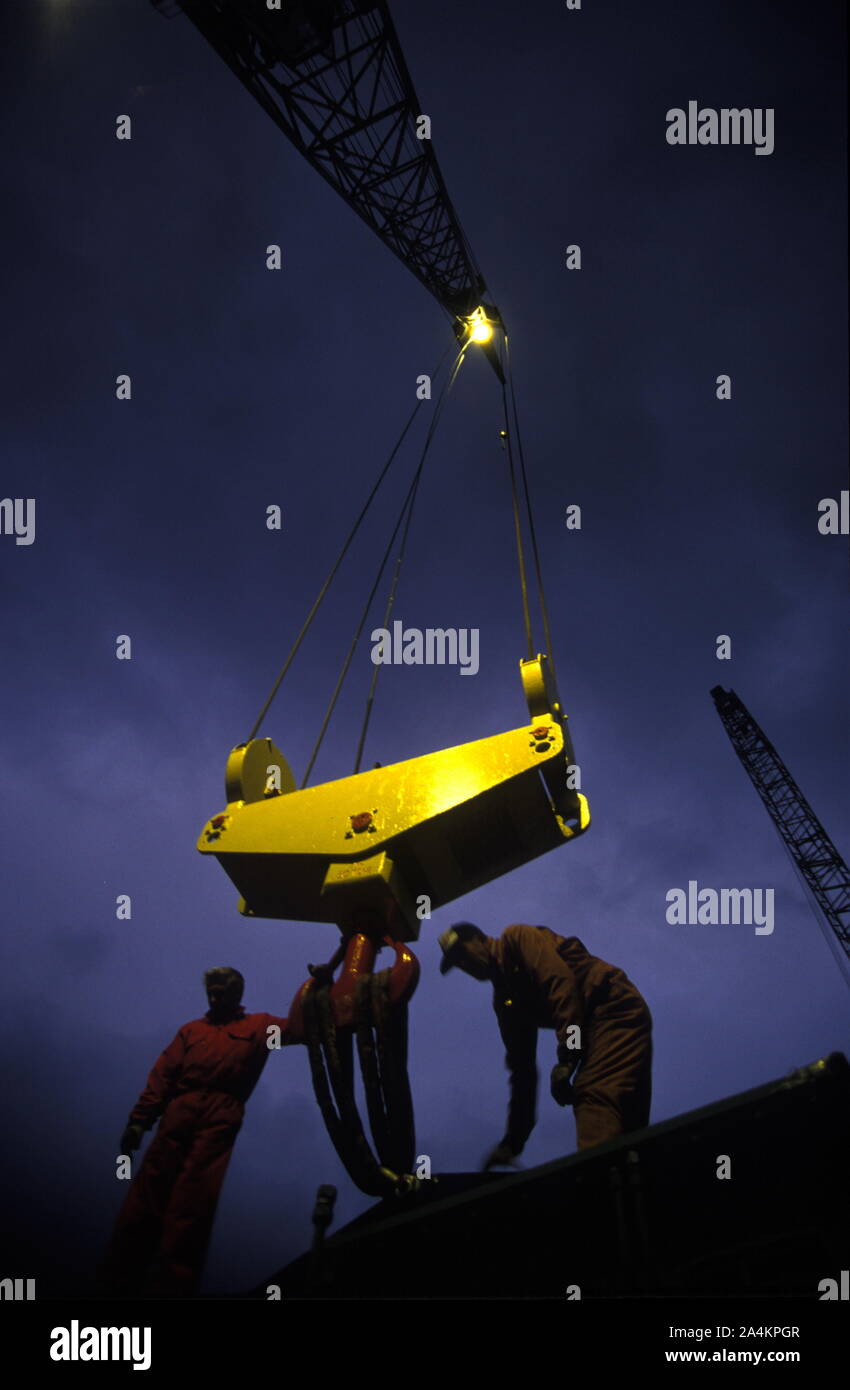 Working with a crane Stock Photo - Alamy
