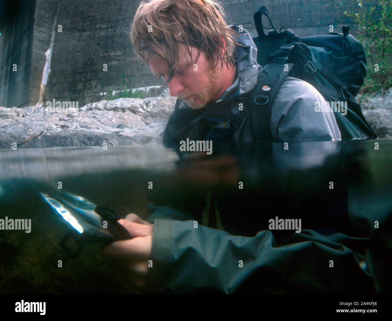 Hikers in waterproof jackets hi-res stock photography and images - Alamy