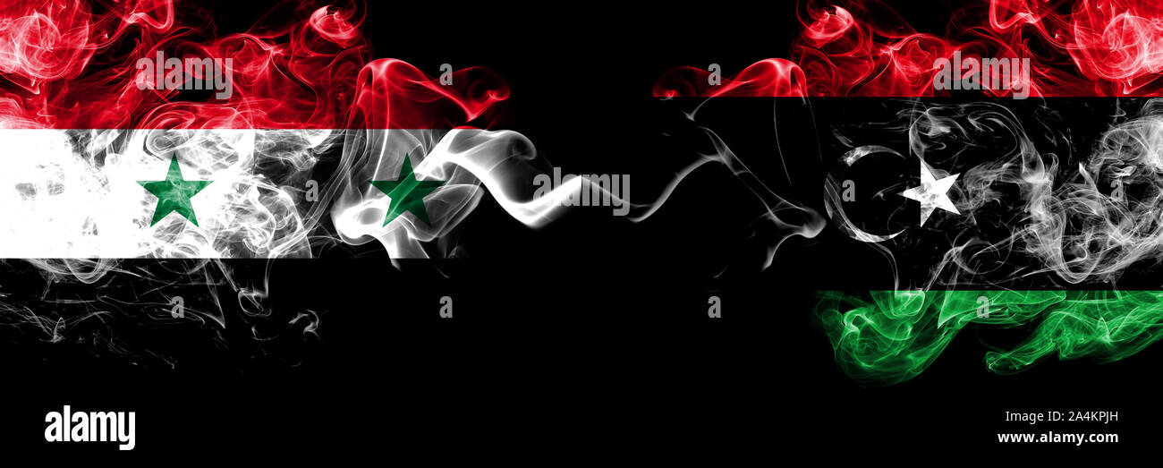 Syria vs Libya, Libyan smoke flags placed side by side. Thick colored ...