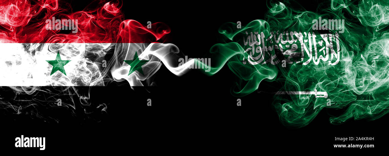 Syria vs Saudi Arabia, Arabian smoke flags placed side by side. Thick ...