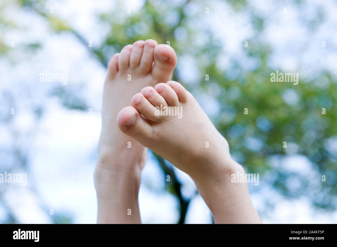 Toes in the air Stock Photo - Alamy