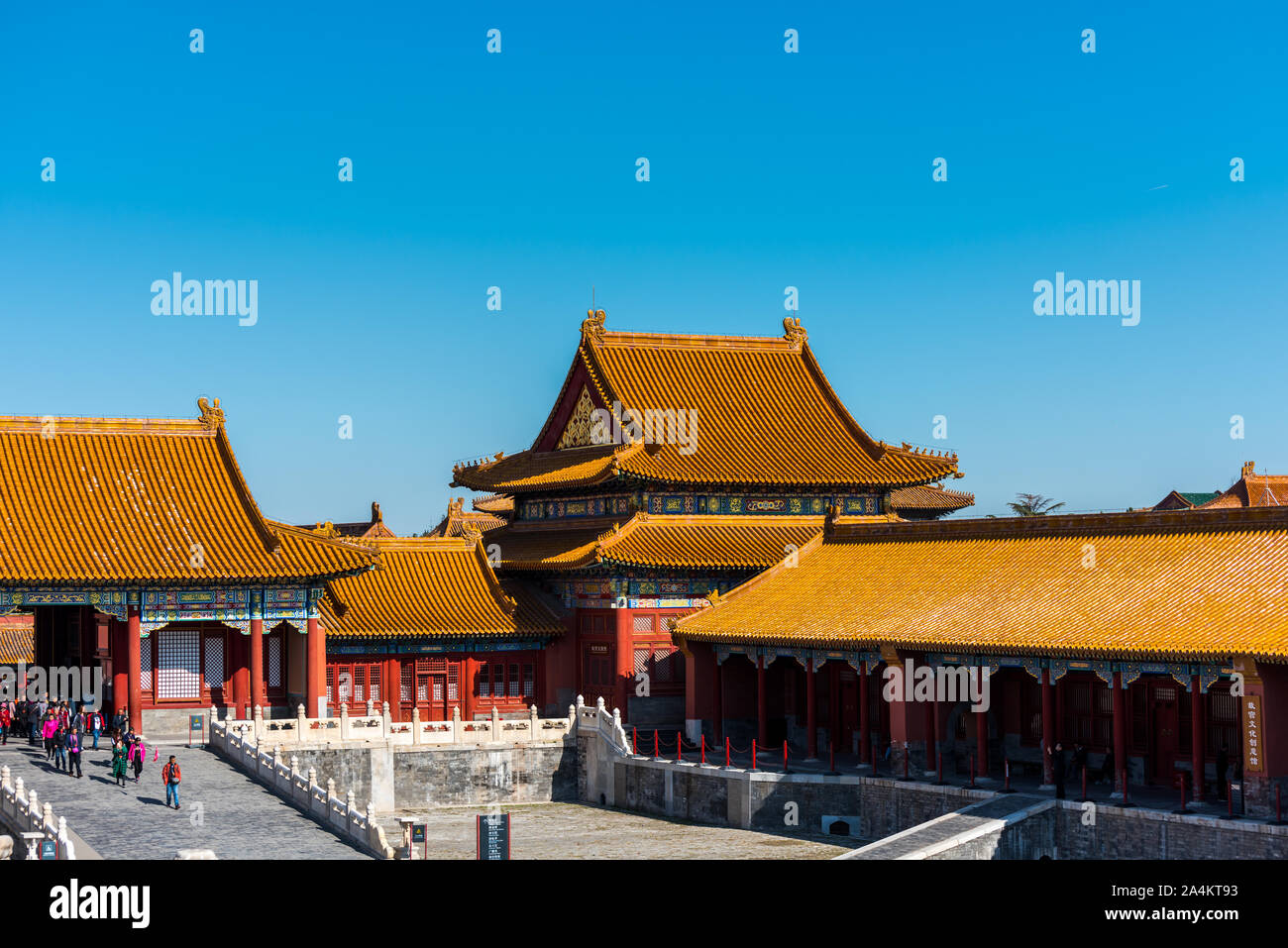 Red wall and golden tiles rooftops of The Forbidden City,the former ...