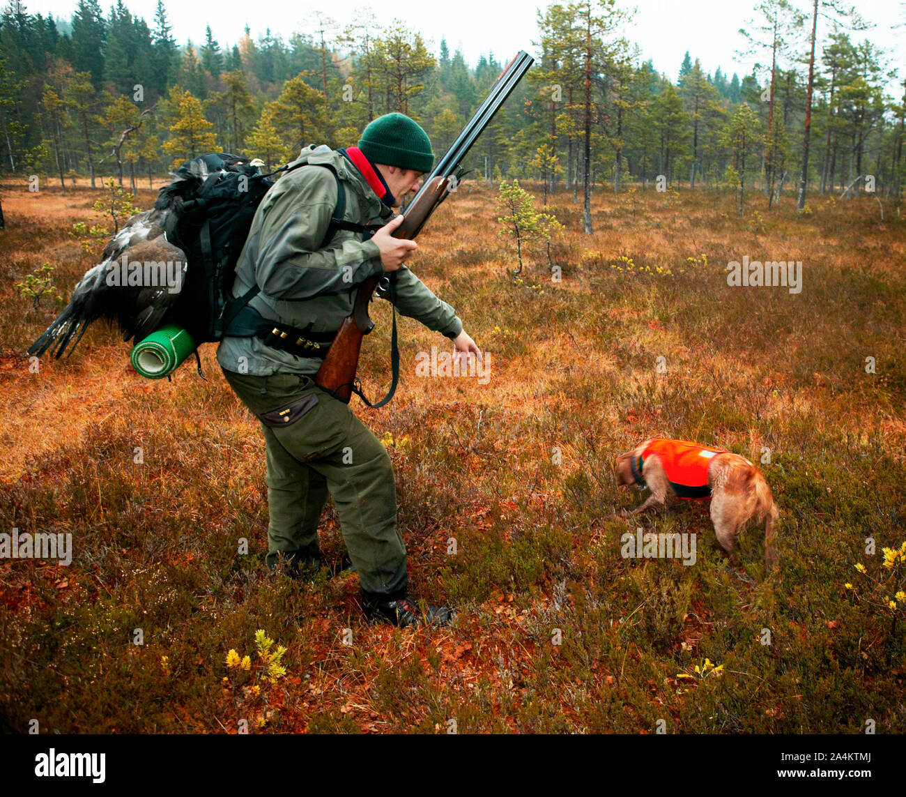 Men carrying dead animals hi-res stock photography and images - Alamy