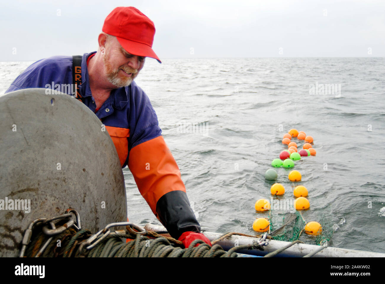 Fisherman at work Stock Photo - Alamy