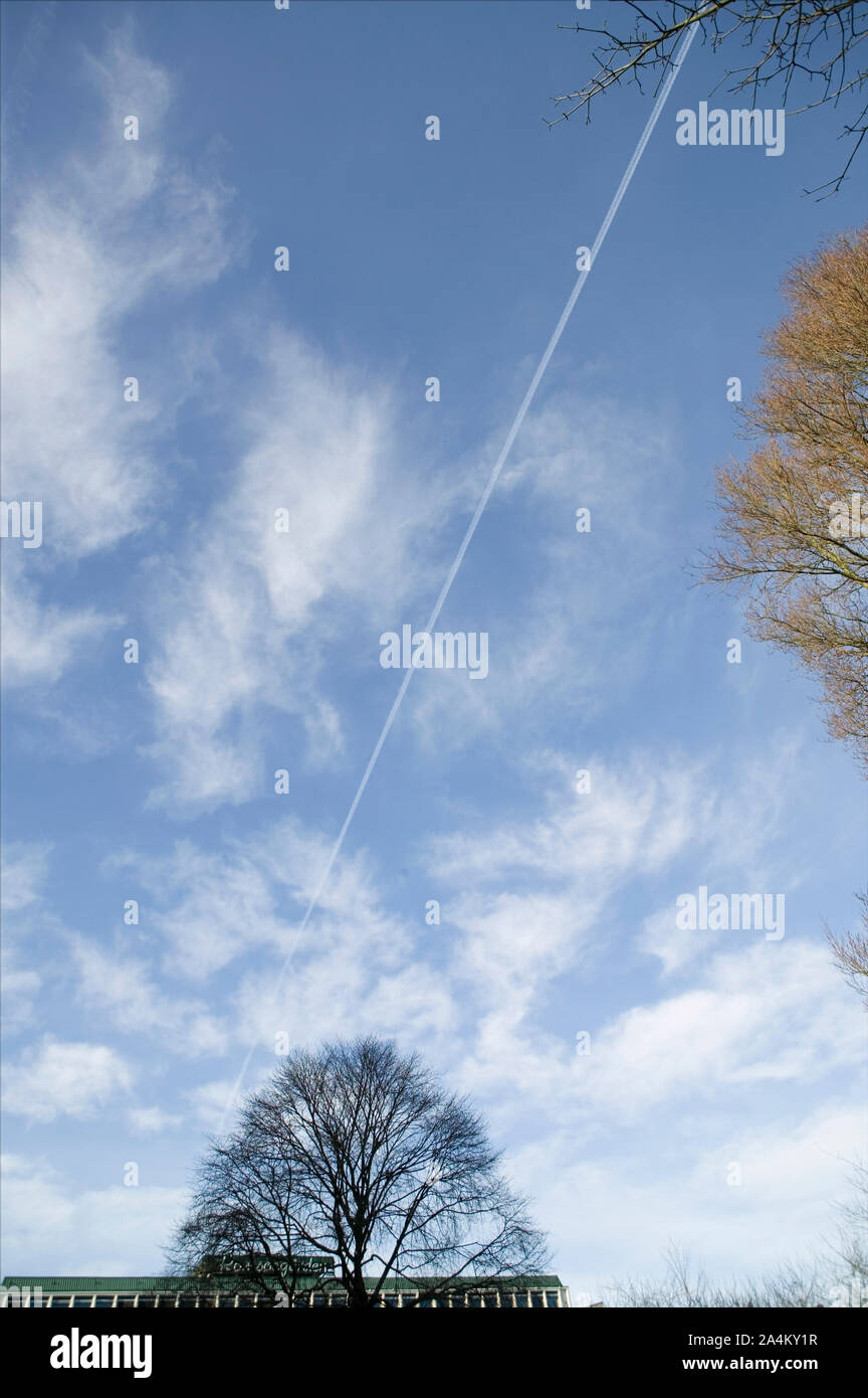 Contrail - condensation trails from plane Stock Photo - Alamy