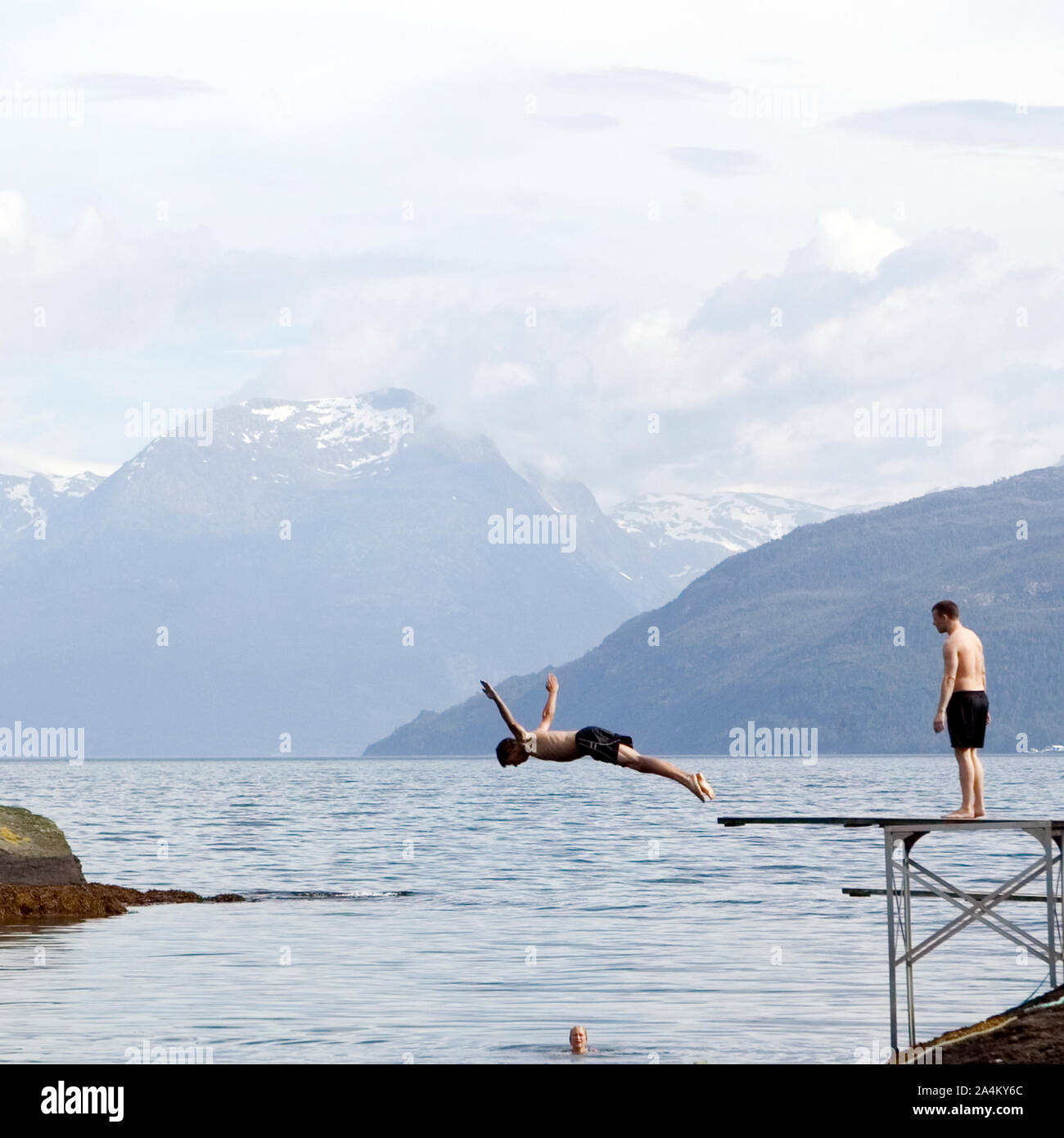 Diving into a fjord in Norway Stock Photo - Alamy