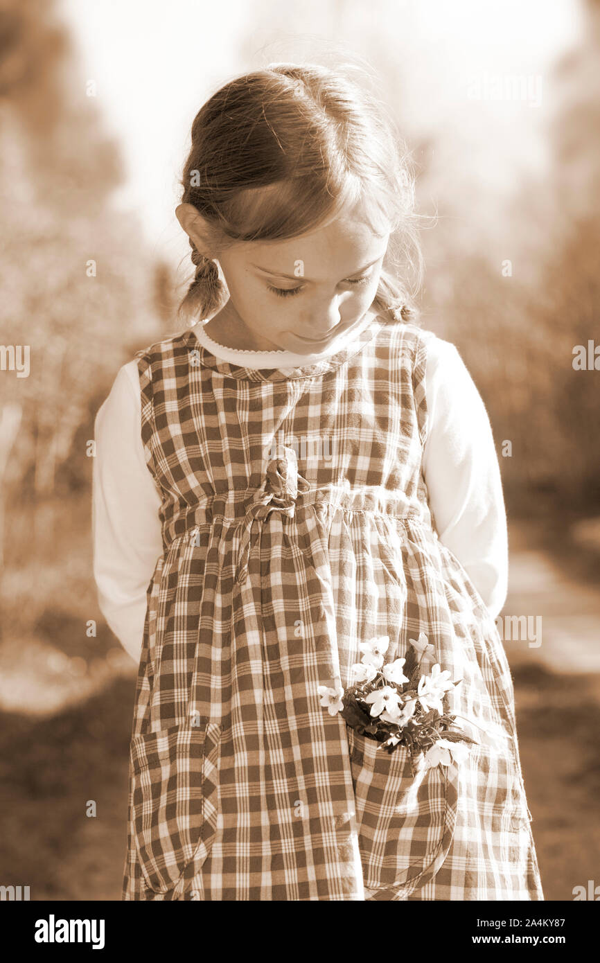 Girl with anemones Stock Photo - Alamy