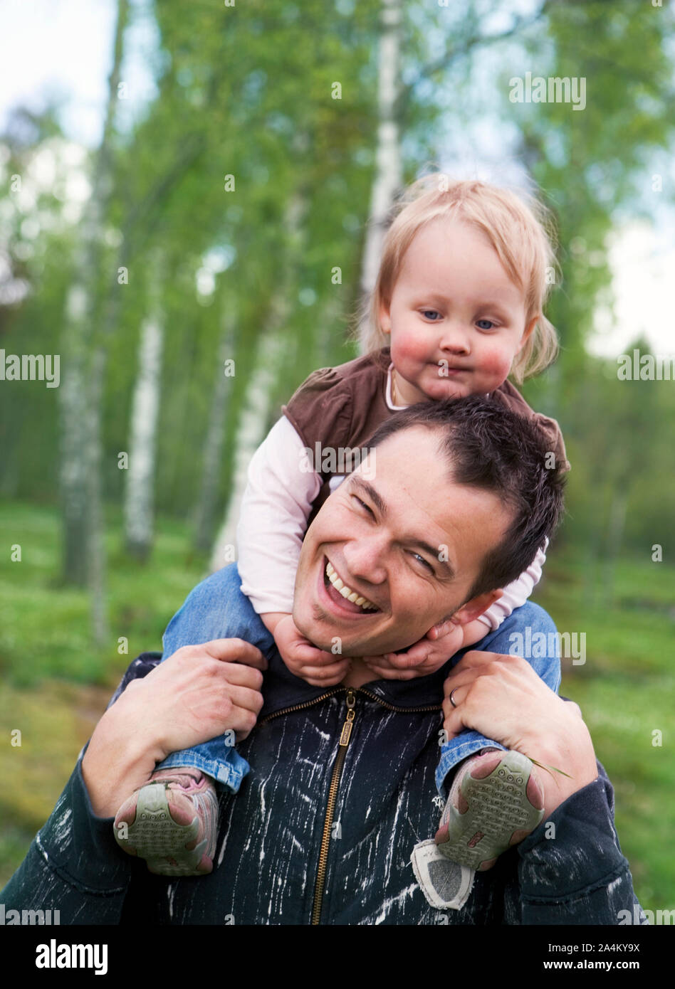 Blond boy with his father Stock Photo - Alamy