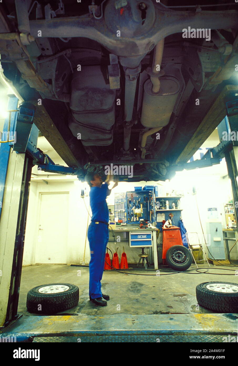Motor mechanic, car repairer in a car repair shop. Garage Stock Photo ...