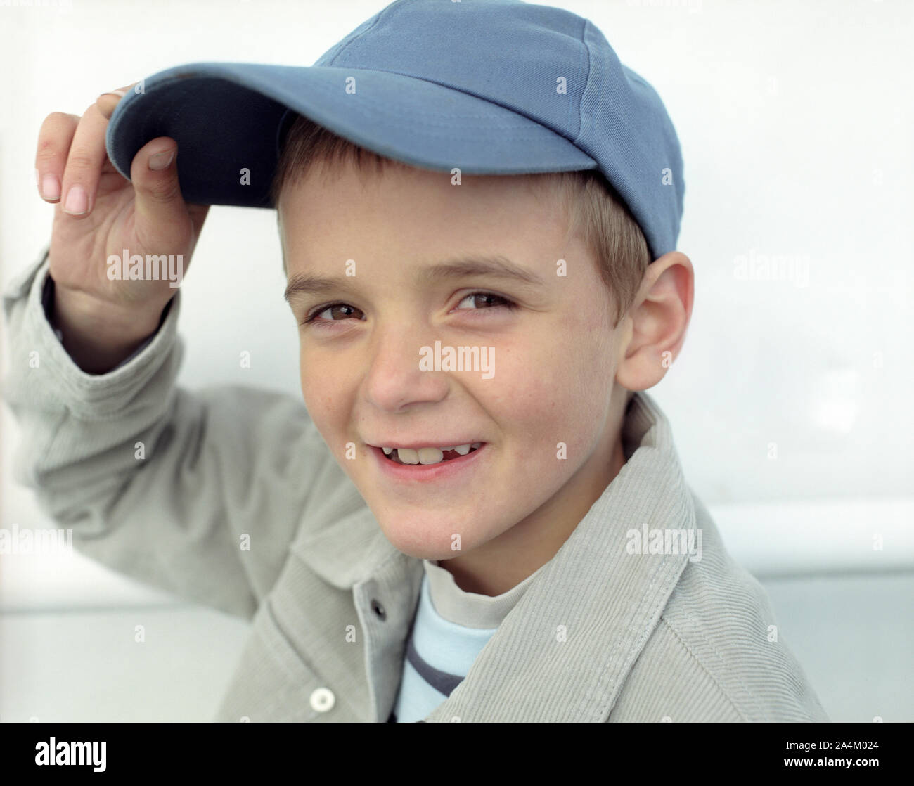 Boy wearing cap Stock Photo - Alamy