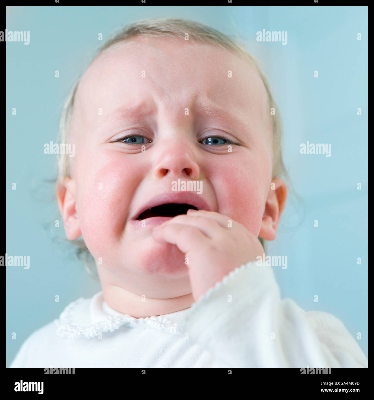 Baby boy crying Stock Photo - Alamy
