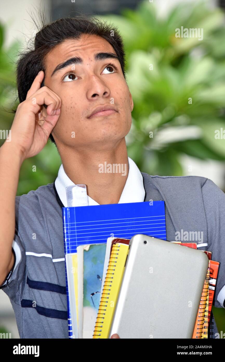 University Diverse Boy Student Thinking With Notebooks Stock Photo - Alamy