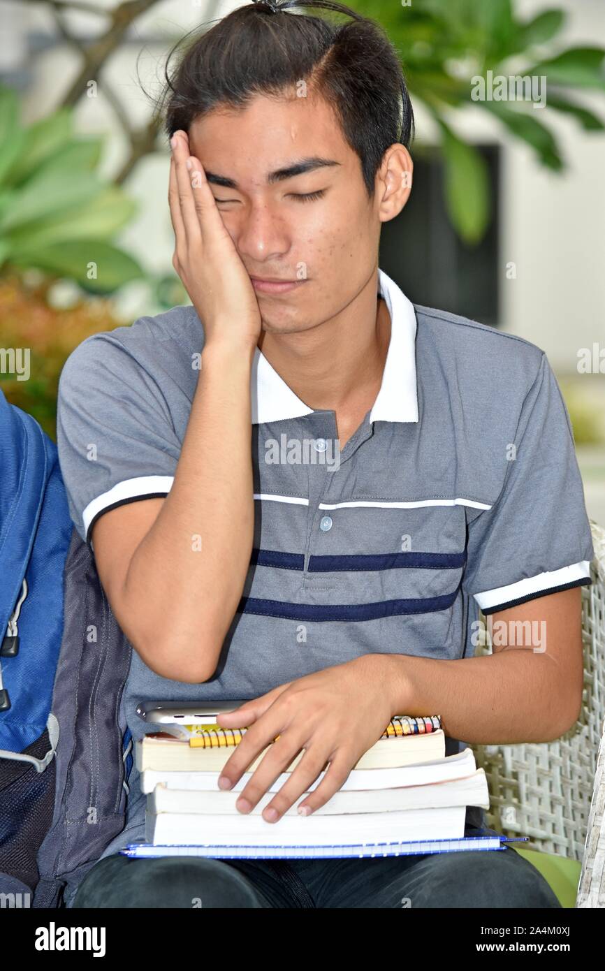 An Unhappy Filipino Student Stock Photo - Alamy