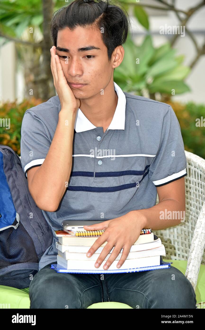 Youthful Asian Student And Sadness Stock Photo - Alamy