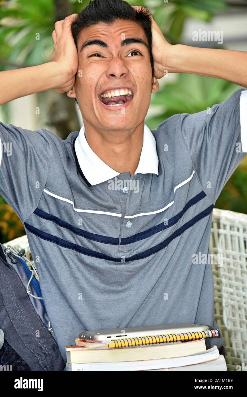 Male Student And Confusion With Books Stock Photo - Alamy