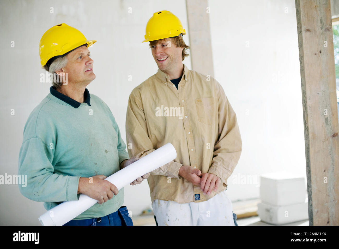 Two men at a Construction site Stock Photo - Alamy