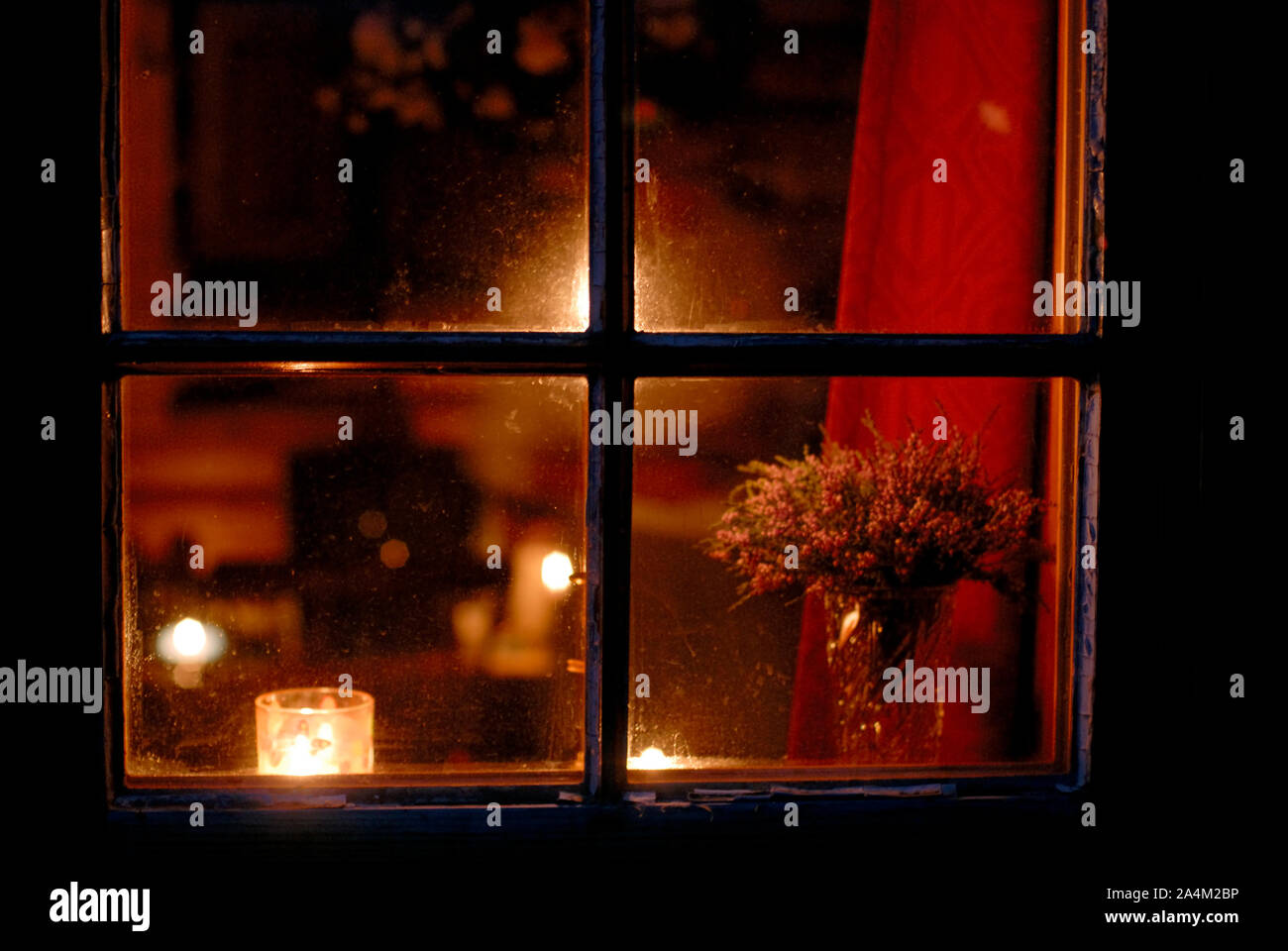 Cosy window at night Stock Photo - Alamy