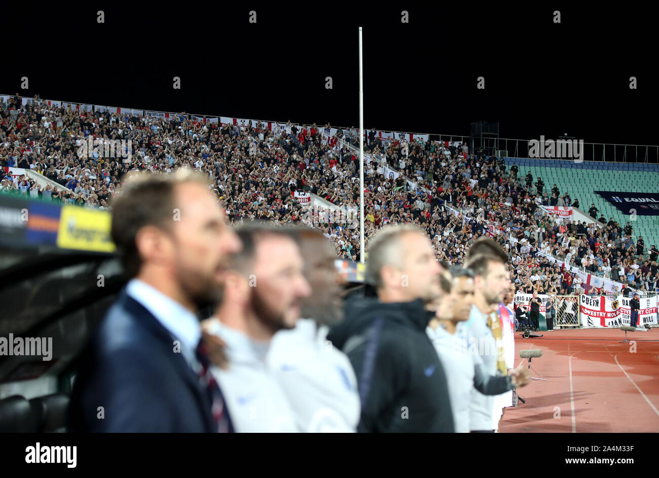 England fans in the stands as the England bench observe the anthems ...