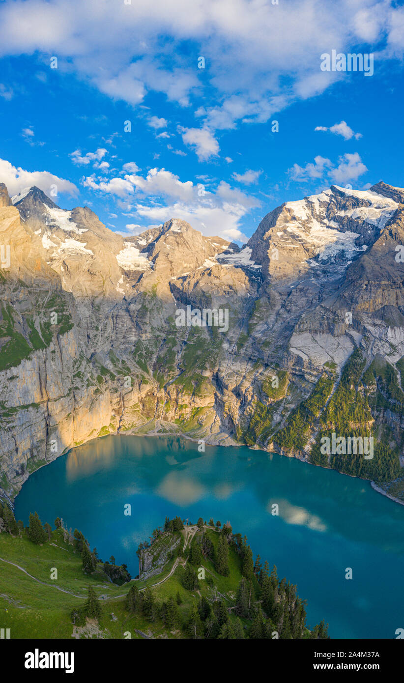 Aerial panoramic of Oeschinensee lake during sunset, Bernese Oberland ...