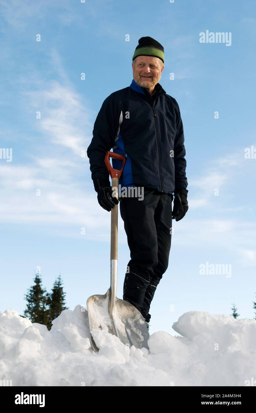 Man with shovel Stock Photo - Alamy