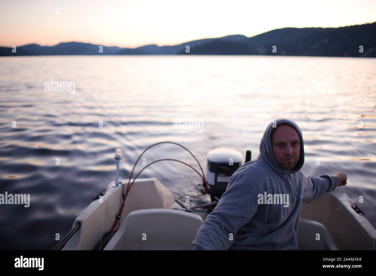 People driving boats hi-res stock photography and images - Alamy