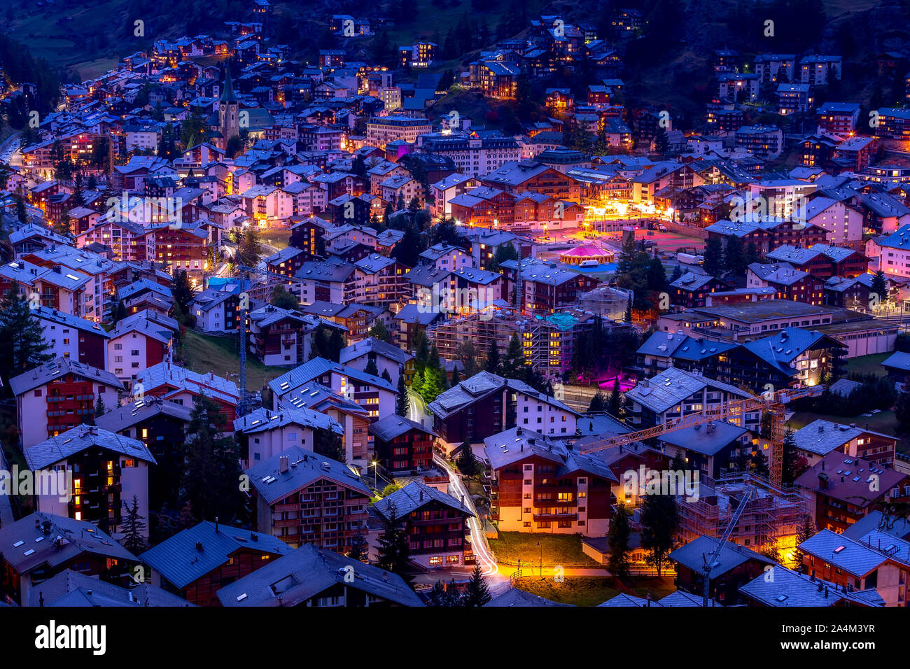 Aerial night panoramic view of Zermatt village at dusk, Switzerland ...
