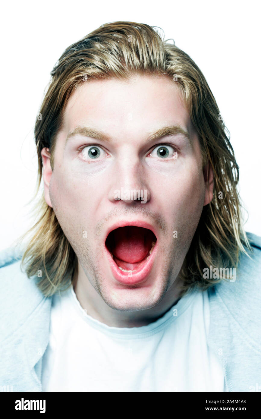 Man with eyes wide open - shocked Stock Photo - Alamy